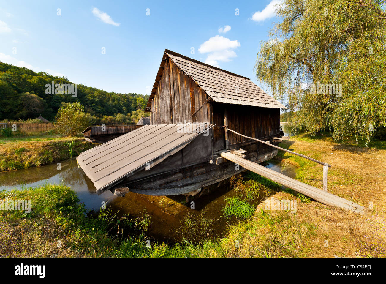 Retro wooden watermill hi-res stock photography and images - Alamy