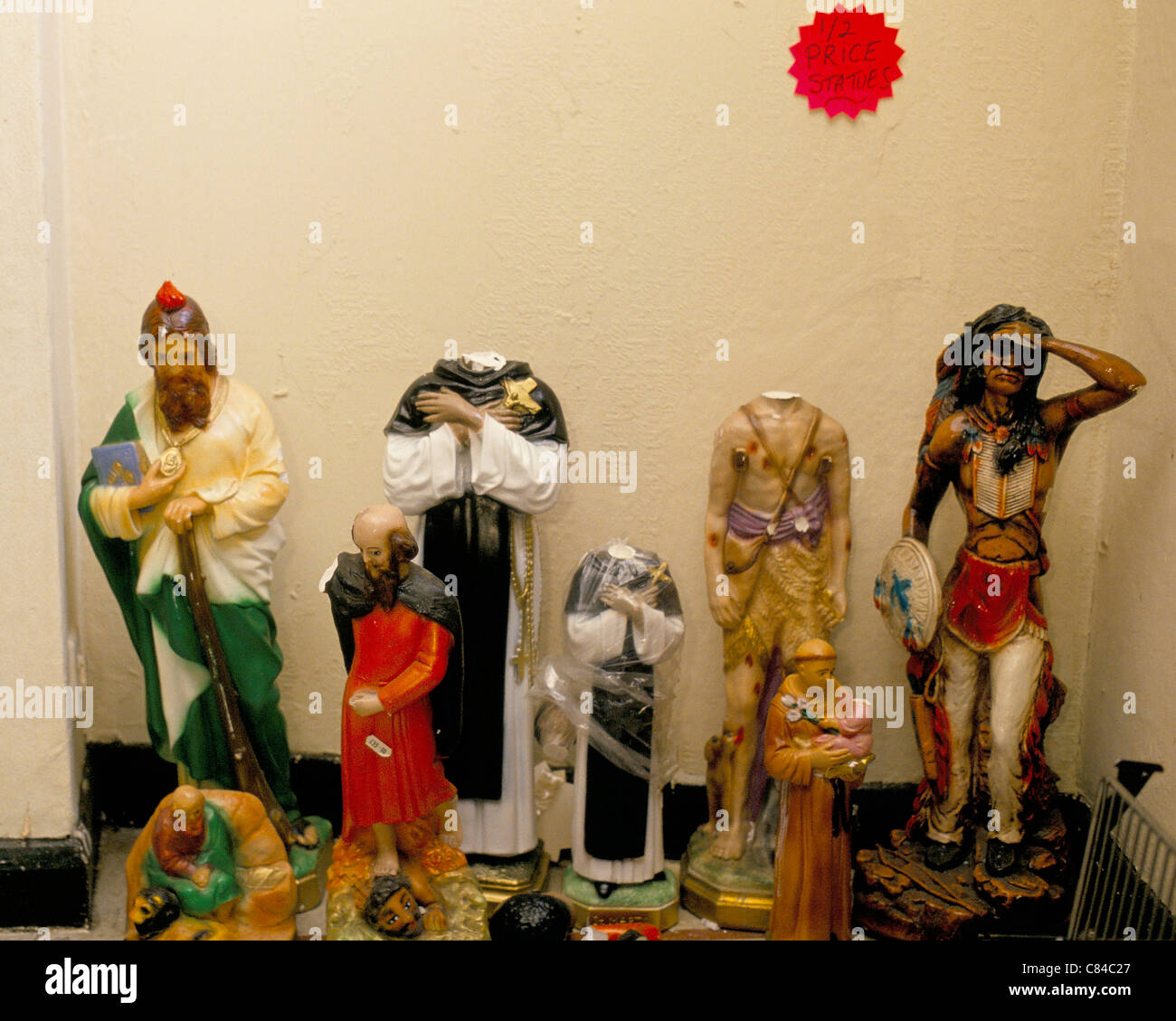Statues and religious effigies on sale in a Voodoo Shop in Hackney ...