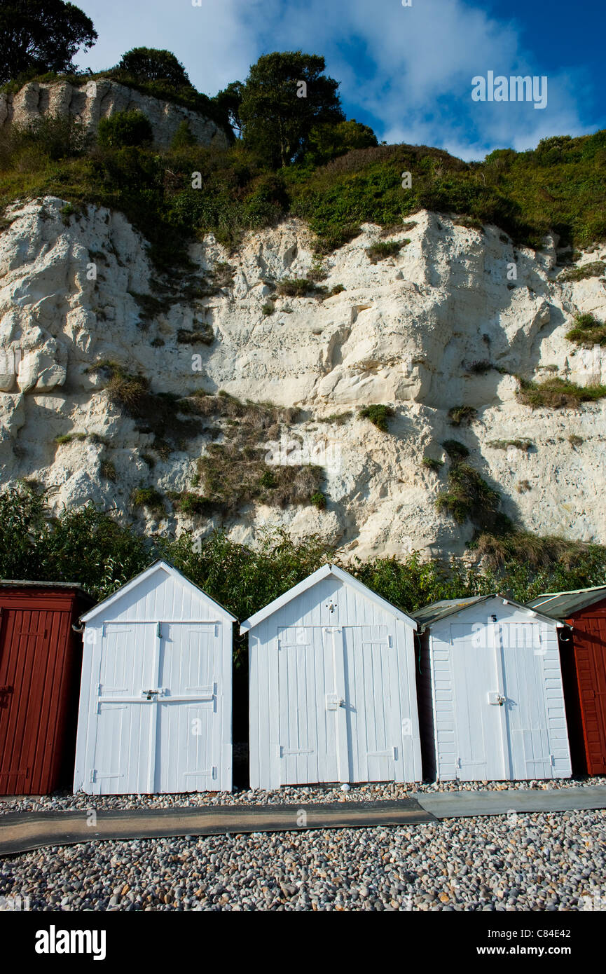Beach huts and white cliffs at Beer, Devon, England Stock Photo - Alamy