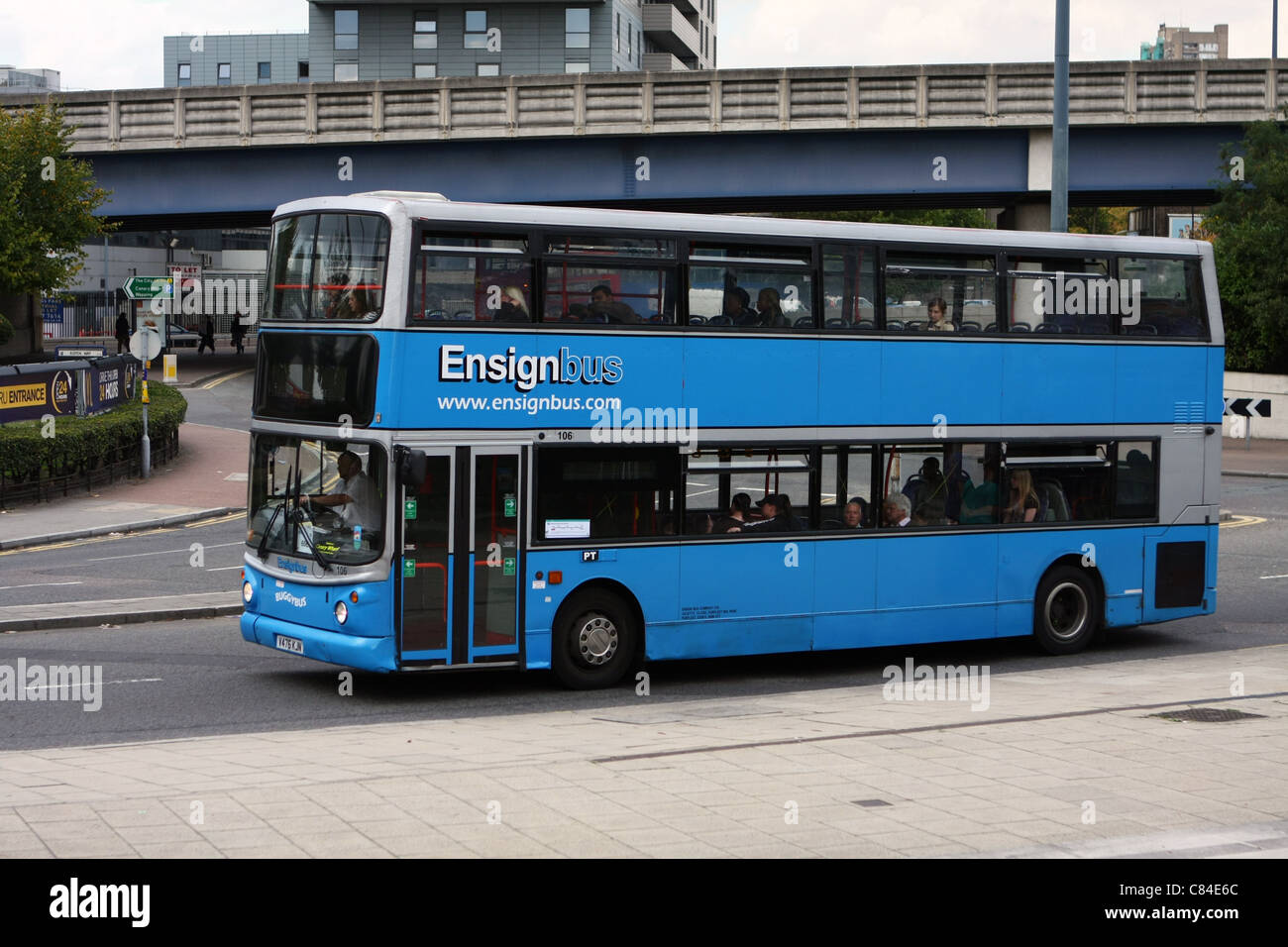 a rail replacement bus traveling towards Canary Wharf, in Poplar ...