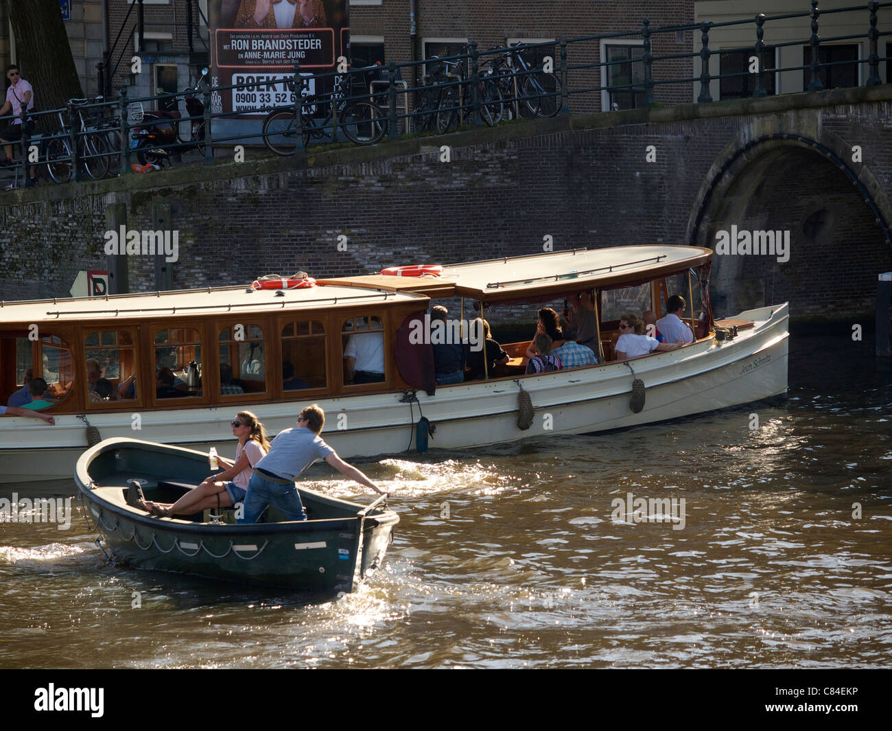 Boats on the water in the city centre of Amsterdam, the Netherlands ...