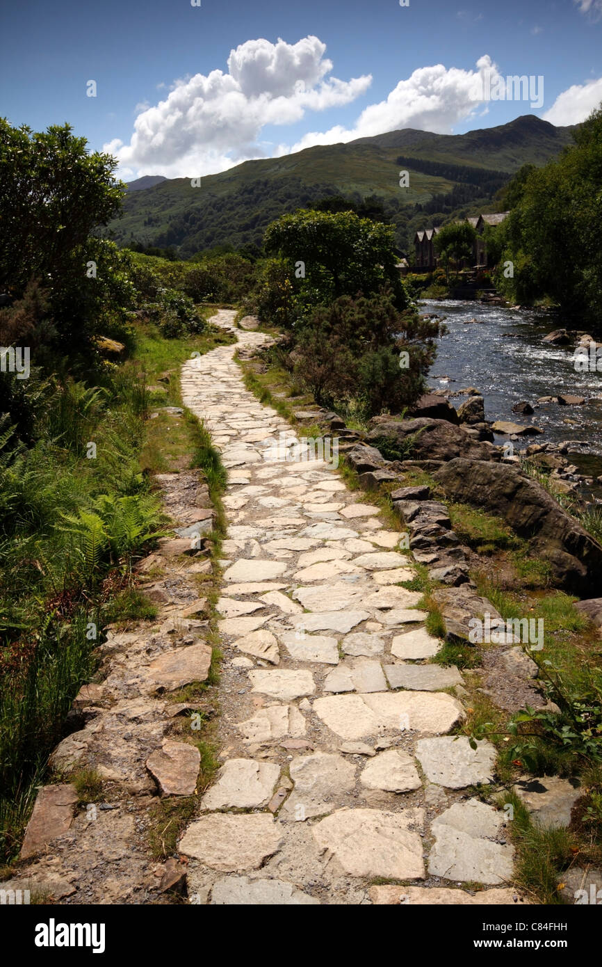 stone footpath leading to picturesque Welsh village of Bedgellert ...