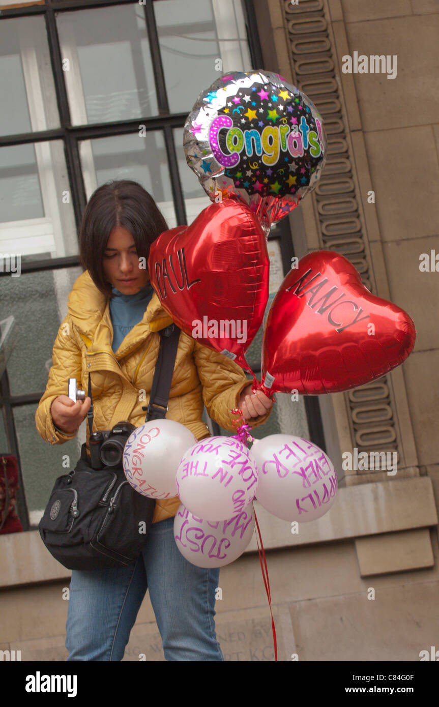 Fan Chiara Amato 35 from Napoli, Italy, waits to give Paul & Nancy some ...