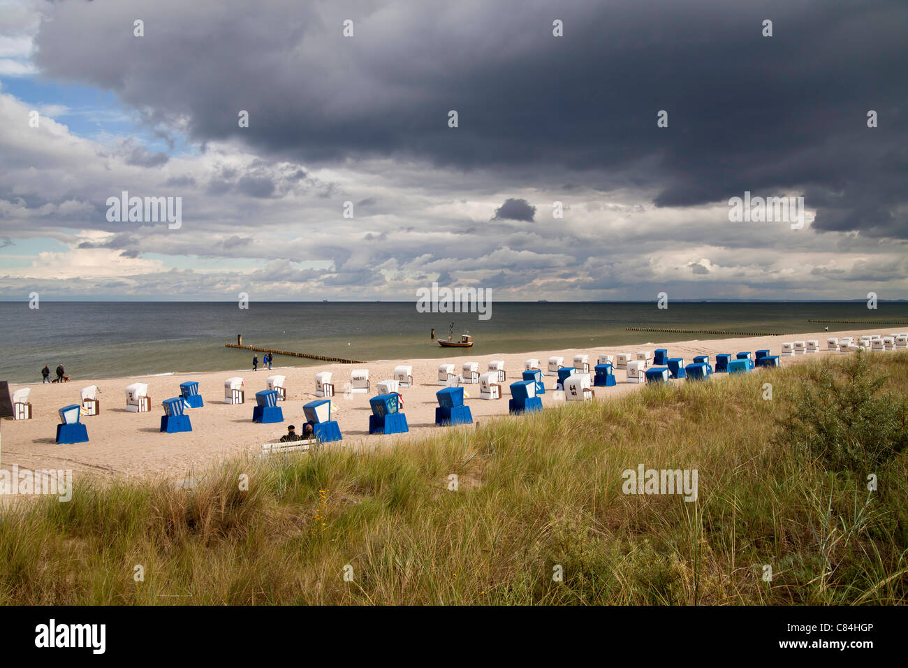 Beach chairs " Strandkorb " and the baltic beach of the coastal resort ...