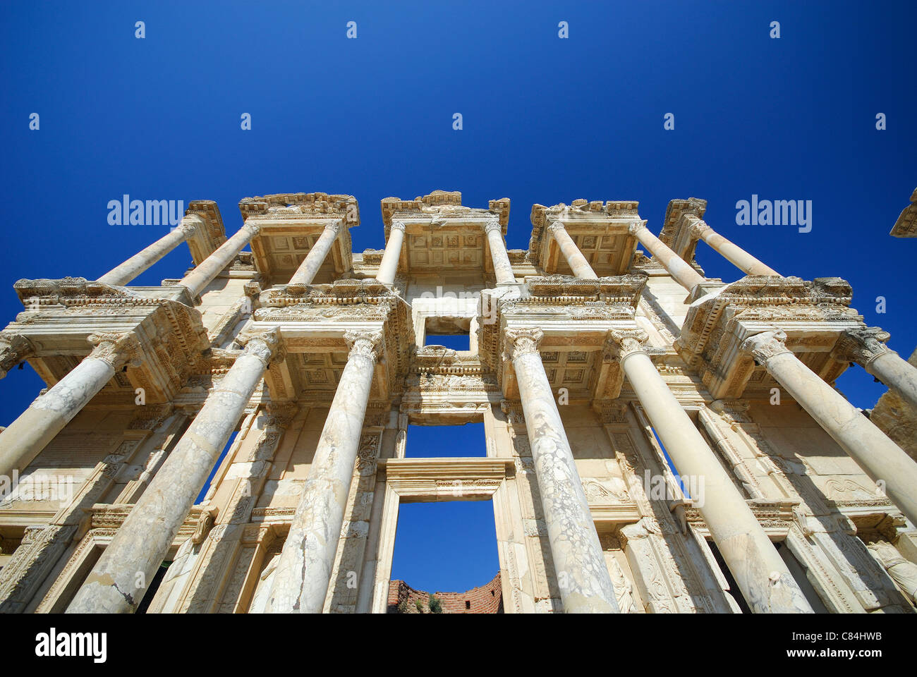 EPHESUS (EFES), TURKEY. A low-angle view of the facade of the Library ...