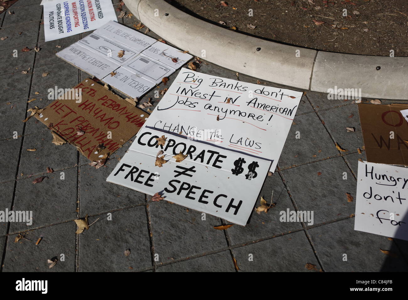 Occupy Bloomington Wall Street protest signs at Peoples Park. The ...