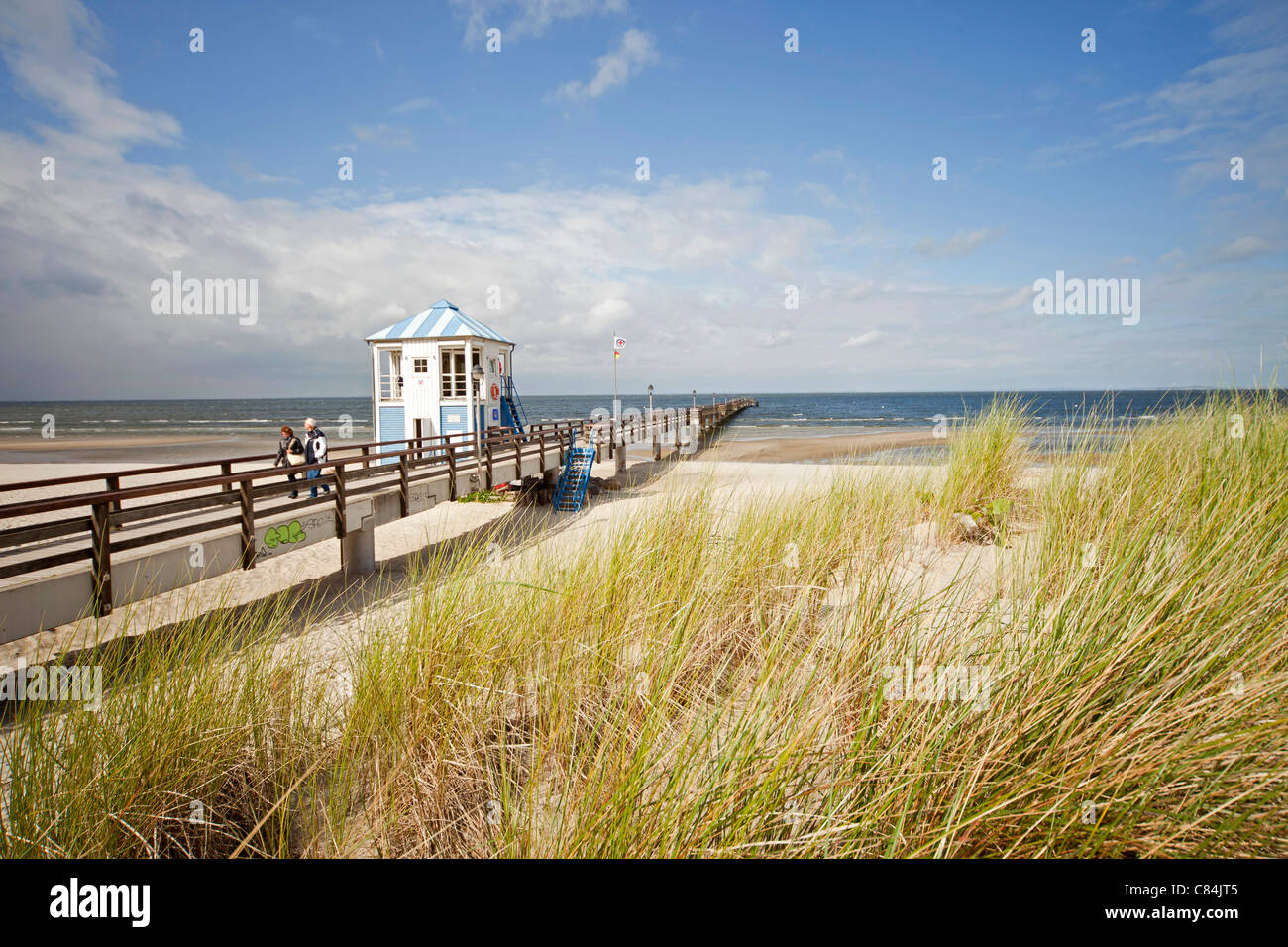 Pier "Seebruecke" and the baltic beach of the coastal resort of Lubmin ...