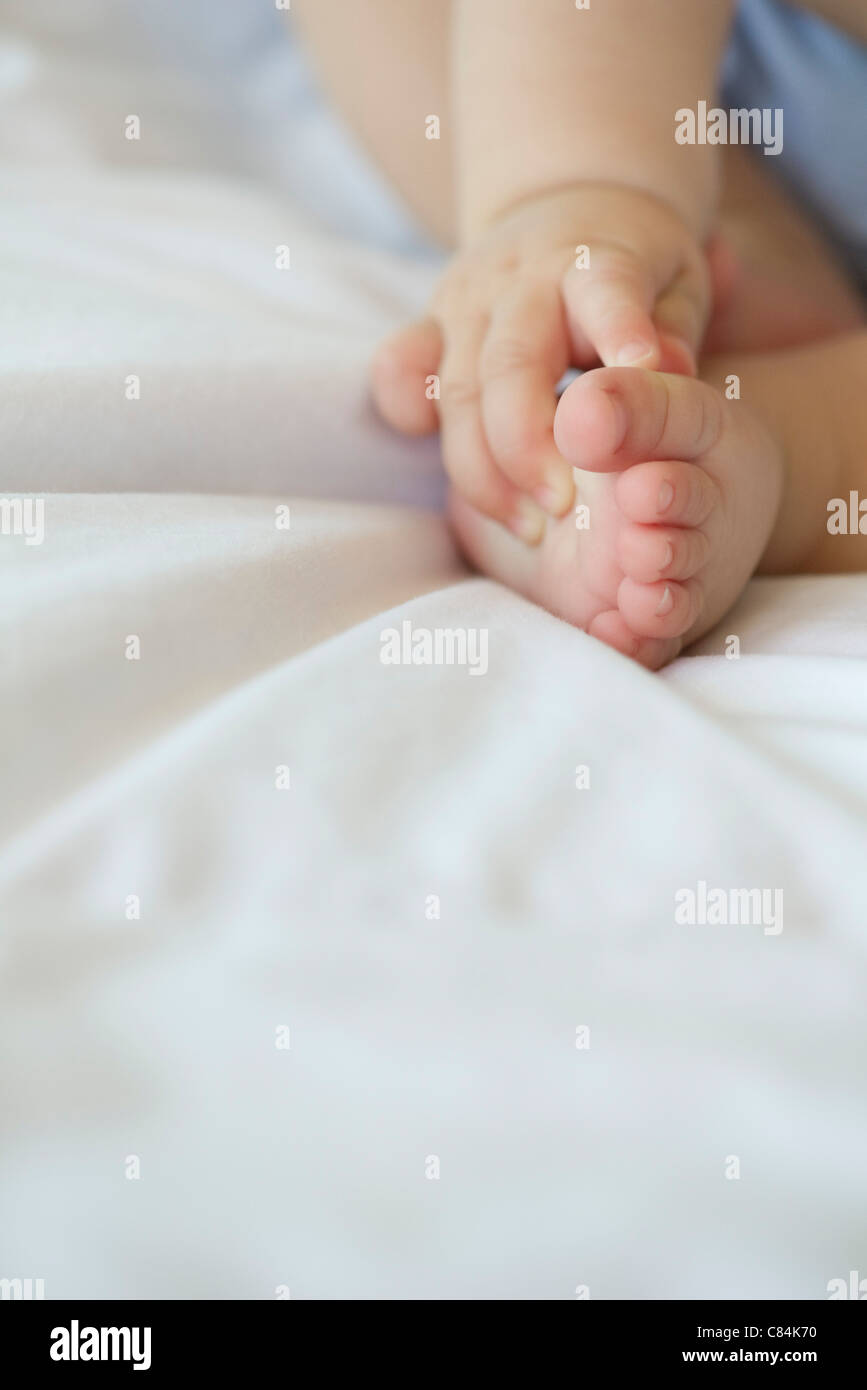 Hand touching toes hi-res stock photography and images - Alamy