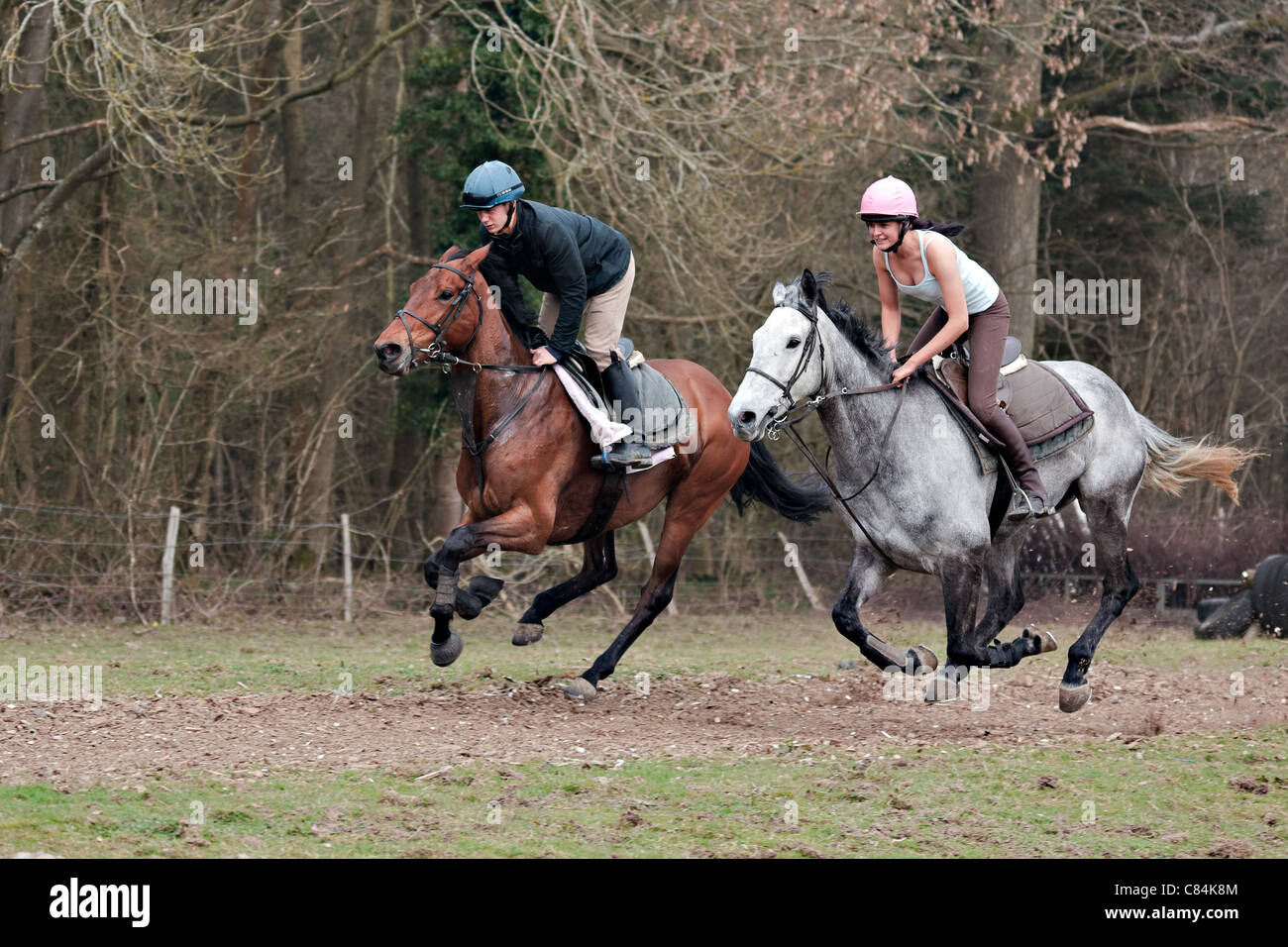 Two young horse riders hi-res stock photography and images - Alamy