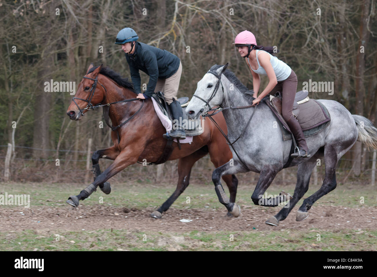 Two young horse riders hi-res stock photography and images - Alamy