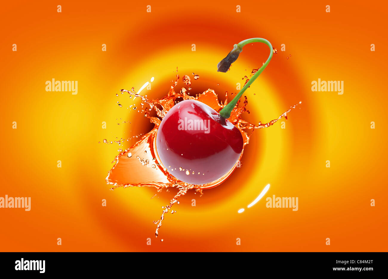The cherry with orange background Stock Photo - Alamy
