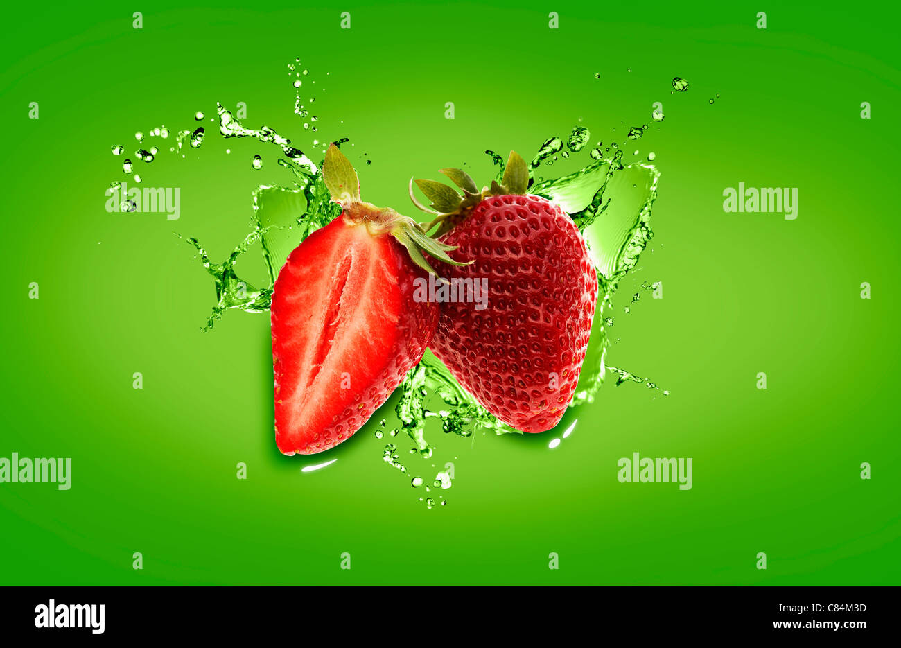 The strawberry with green background Stock Photo - Alamy