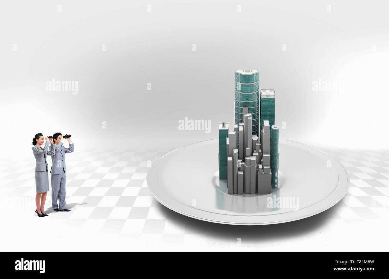 A man and woman looking at buildings with telescope Stock Photo - Alamy