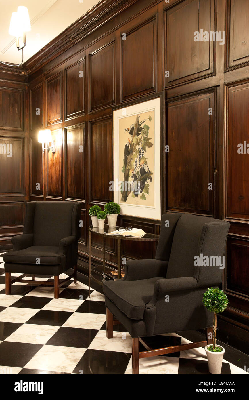 Wood Paneled Vintage Hotel Lobby Interior with John James Audubon Print ...