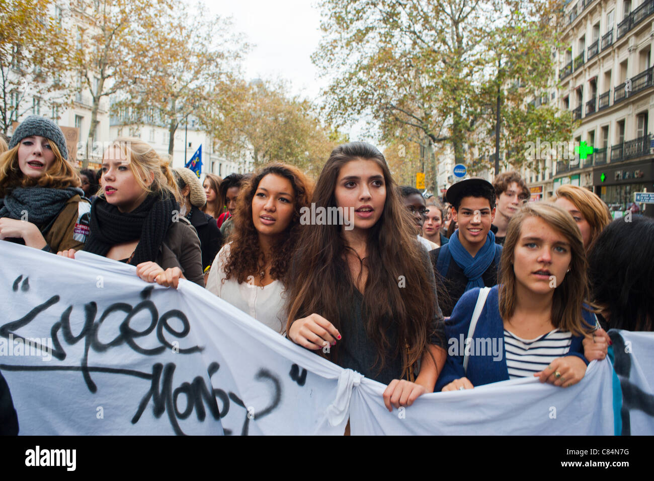 Crowd of French Female students Holding Protest signs, march to protest ...