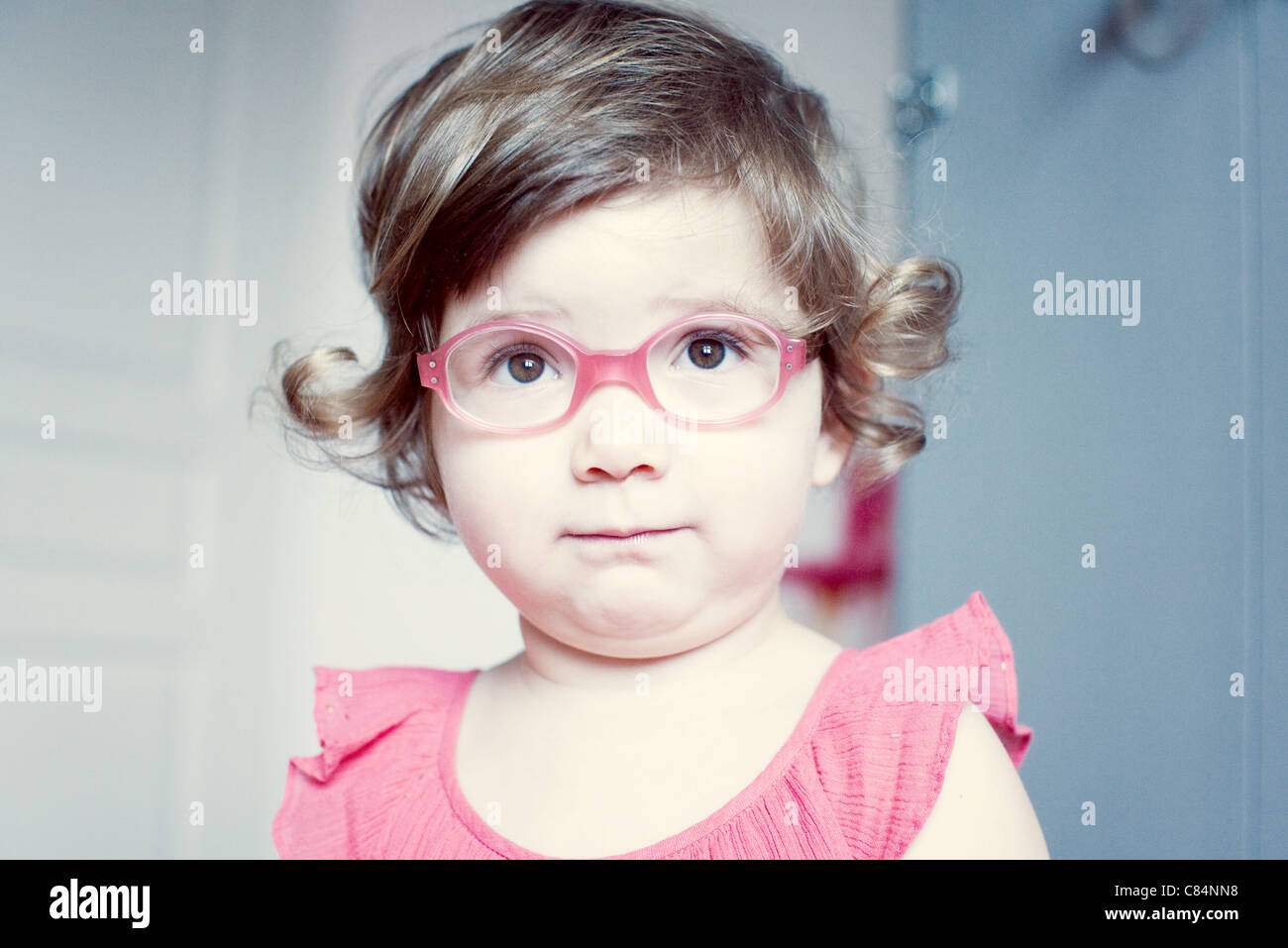 Little girl with glasses, portrait Stock Photo - Alamy