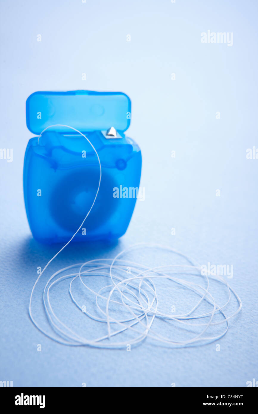 A blue dental floss Stock Photo - Alamy