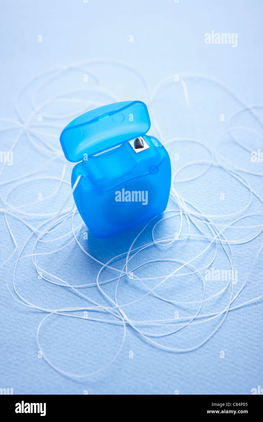A blue dental floss Stock Photo - Alamy