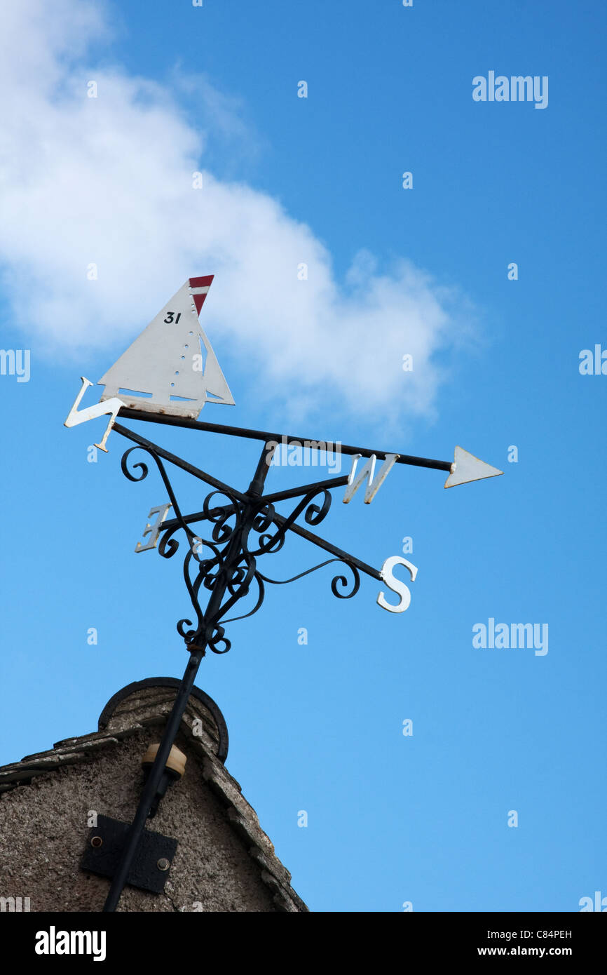 Weather-vane with yacht on direction arrow Stock Photo - Alamy