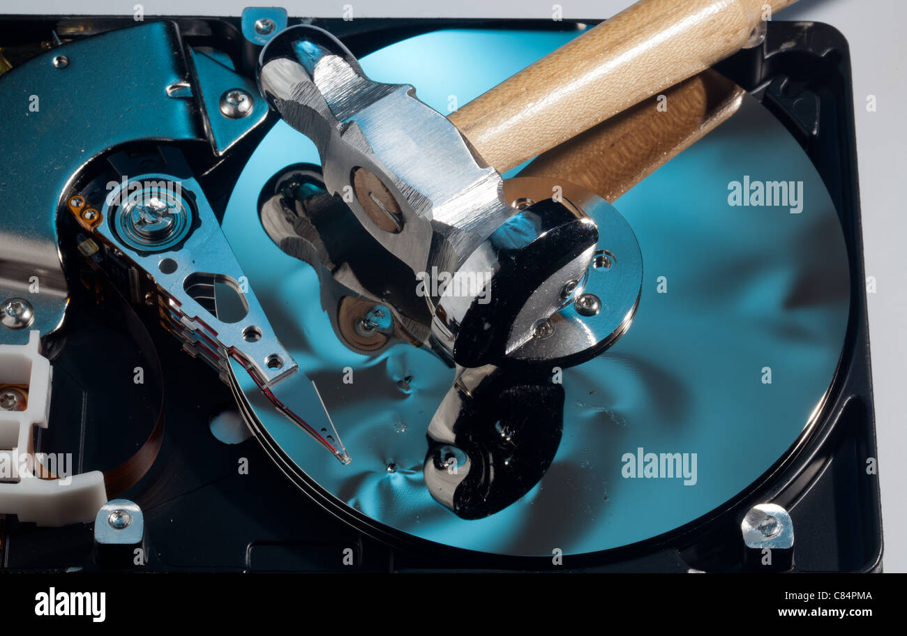 Magnetic disc inside a computer hd unit showing damage to the mirror ...