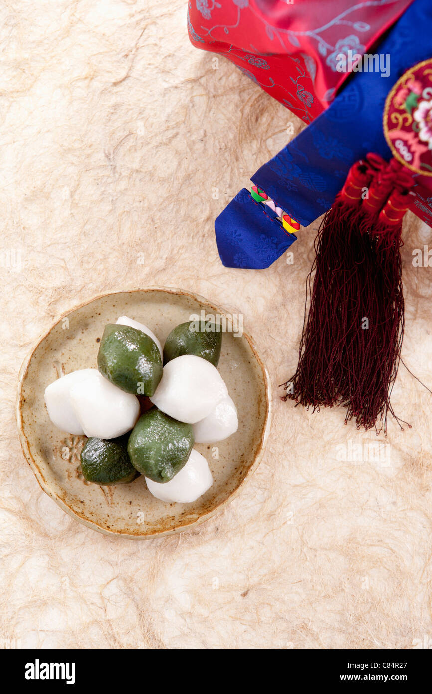 Rice cake with traditional wrapped package around Stock Photo - Alamy