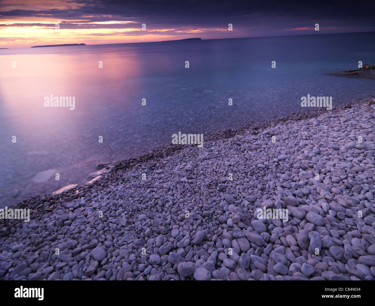 Beautiful sunset scenery of Georgian Bay pebble shore. Bruce Peninsula ...