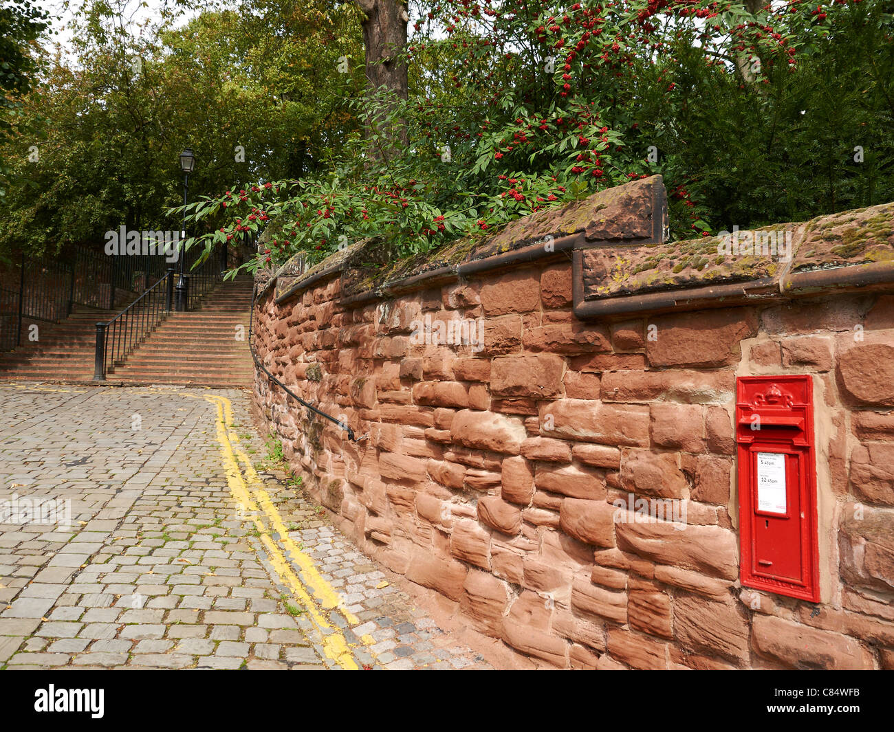 English postbox in stone wall hi-res stock photography and images - Alamy