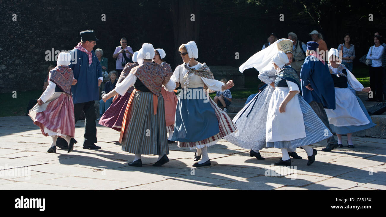 Folk dancers in traditional Dutch costume outside Winchester Cathedral ...
