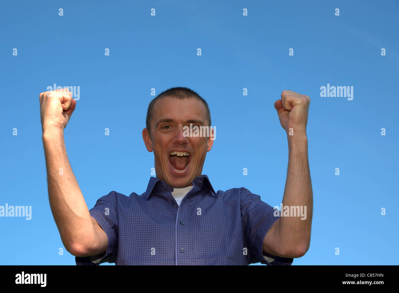 Young coach is happy Stock Photo - Alamy