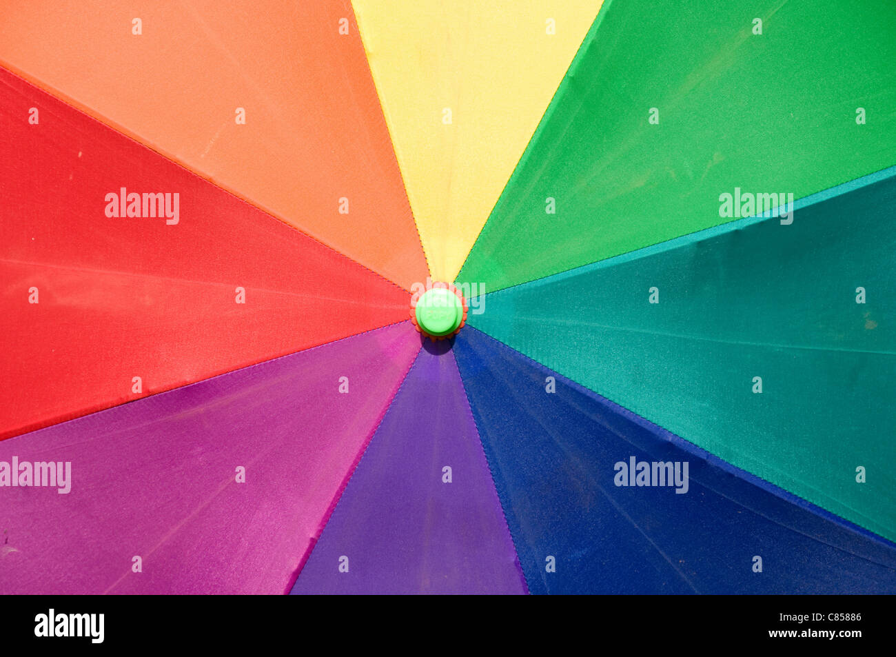 Umbrella showing the colours of the rainbow Stock Photo - Alamy