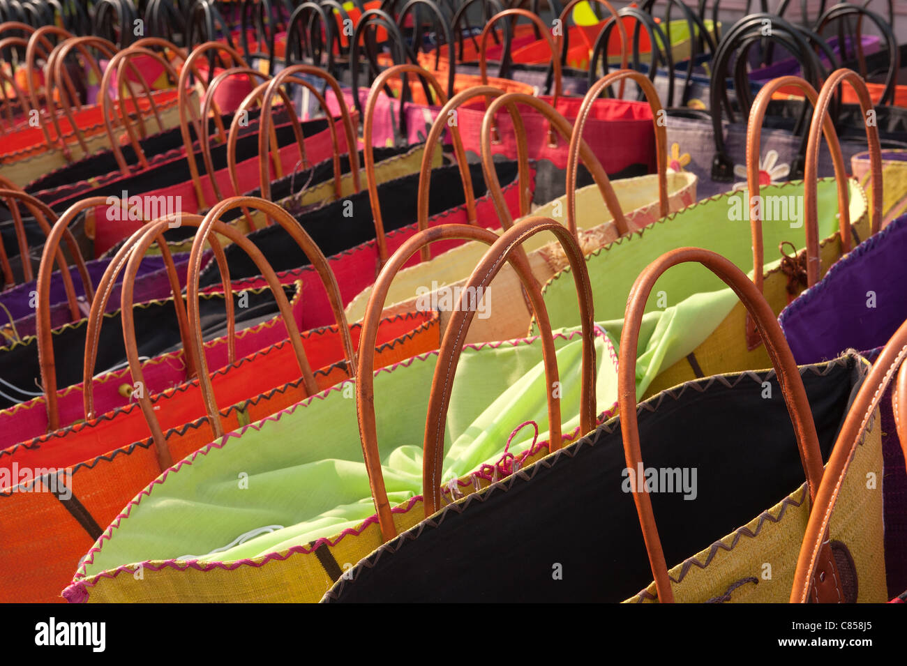Market trader neatly lined up rows of summer baskets Stock Photo - Alamy