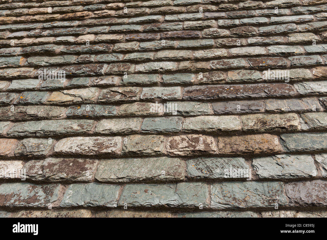 Hand made individual shale and slate roof tiles typical of old North ...
