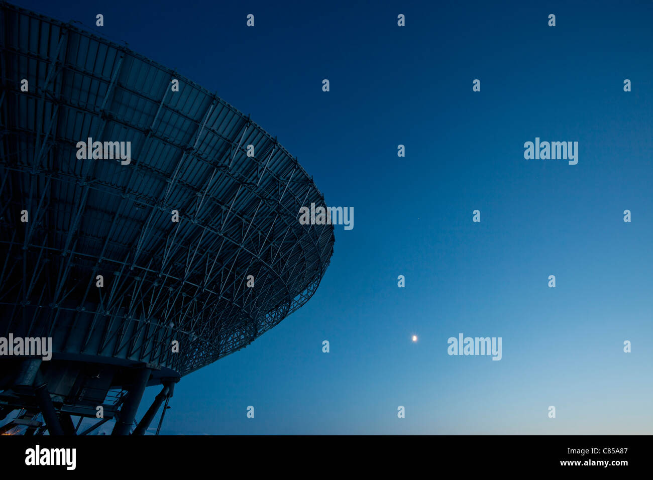 Satellite dish against blue sky Stock Photo - Alamy