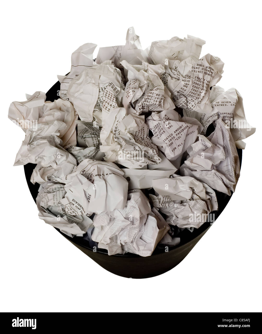 Wastepaper basket full of crumpled paper isolated on white background ...
