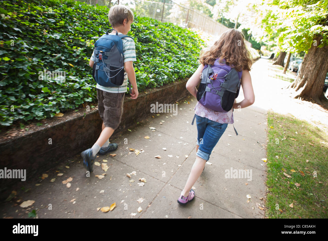 Boy and Girl Walking Home from School, Portland, Oregon Stock Photo - Alamy