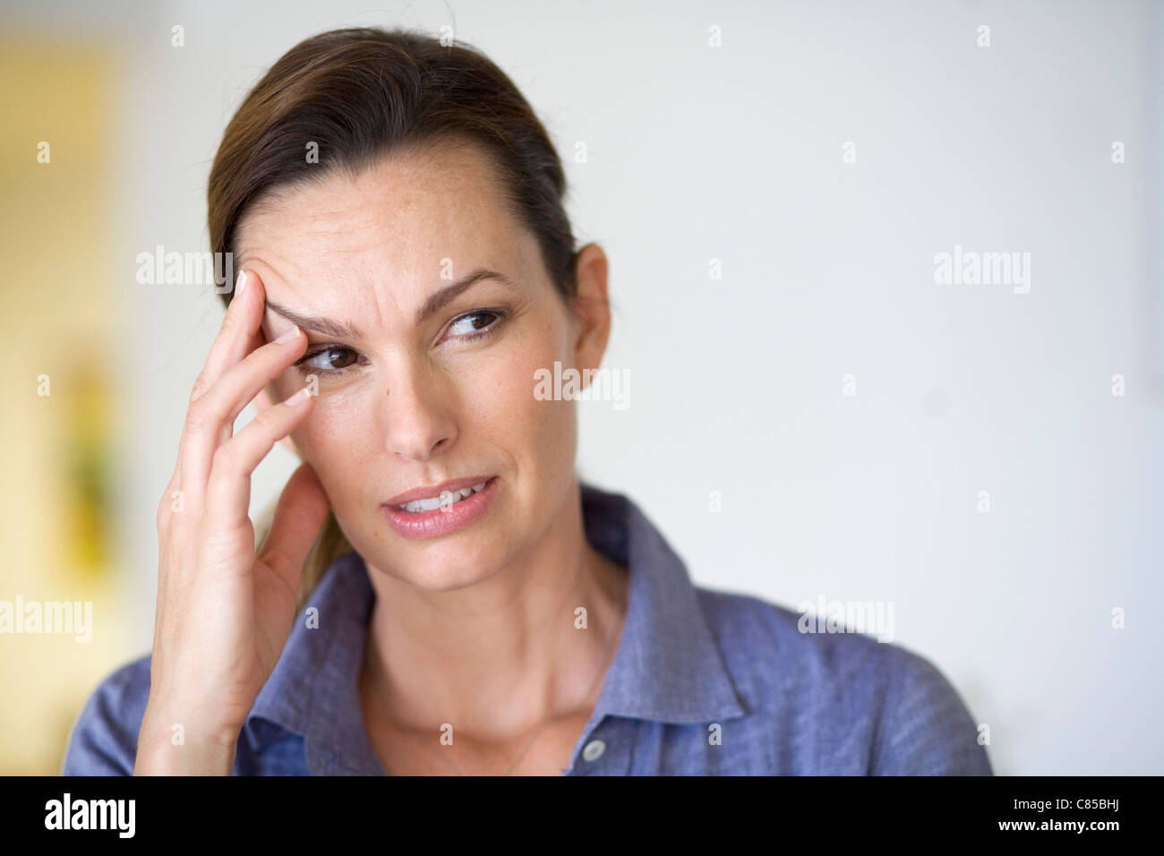 Woman Touching Head, Florida, USA Stock Photo - Alamy
