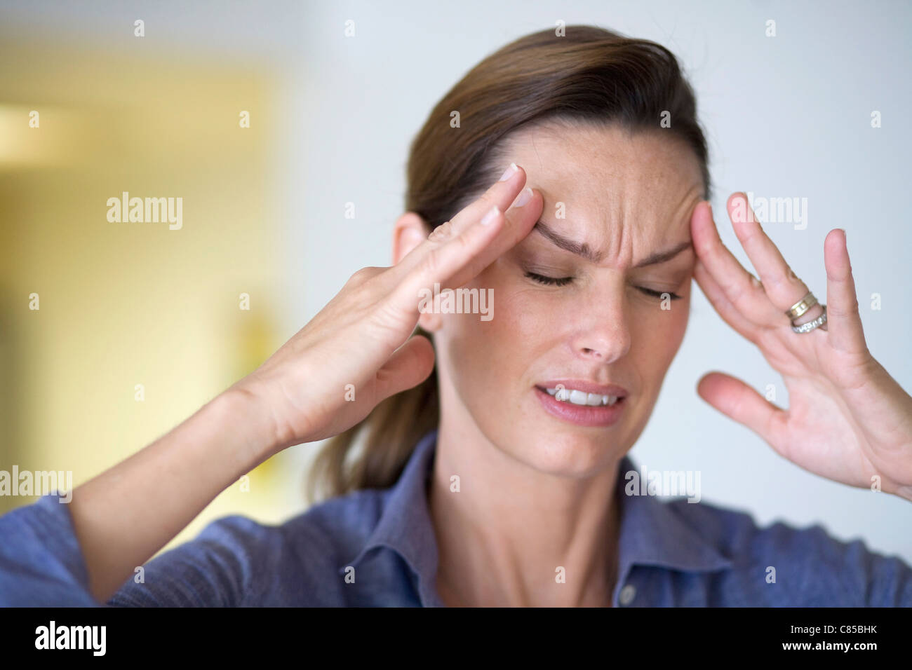 Woman Touching Head, Florida, USA Stock Photo - Alamy