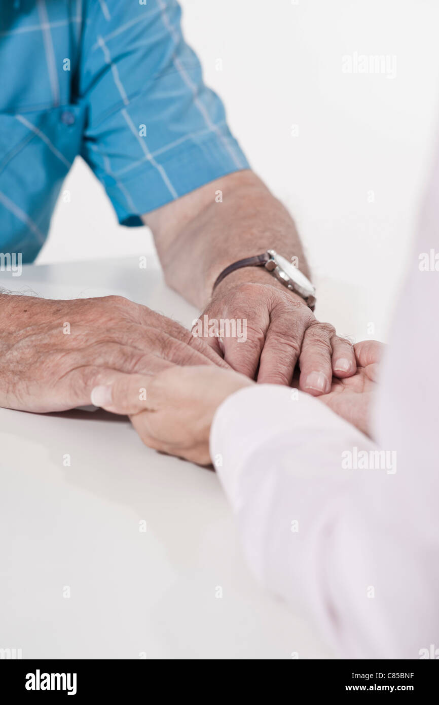 Man and Woman Hodling Hands Stock Photo - Alamy