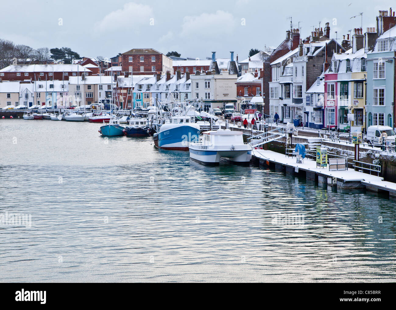 Snow weymouth harbour in winter hi-res stock photography and images - Alamy