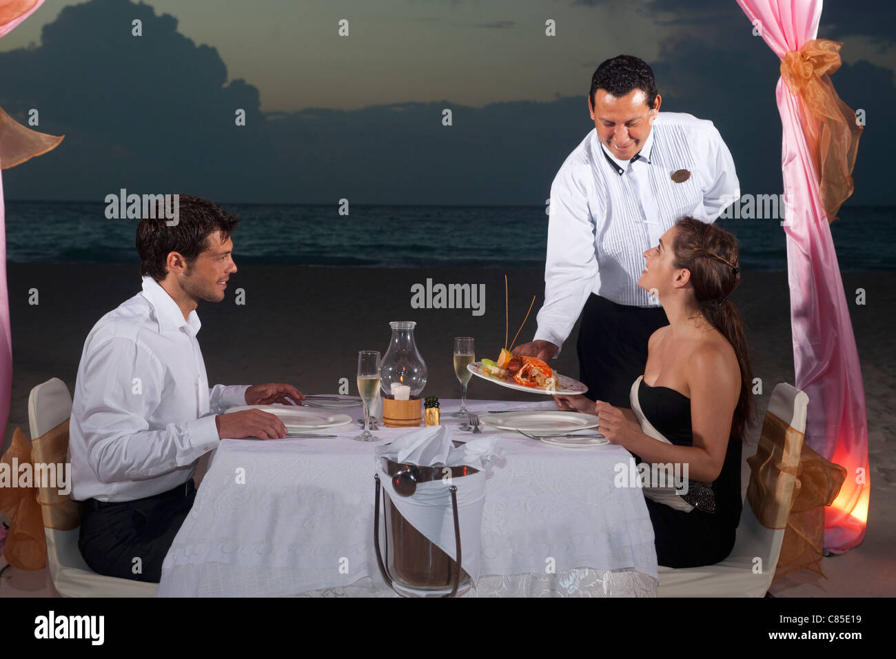 Couple Dining on Beach, Reef Playacar Resort and Spa, Playa del Carmen ...