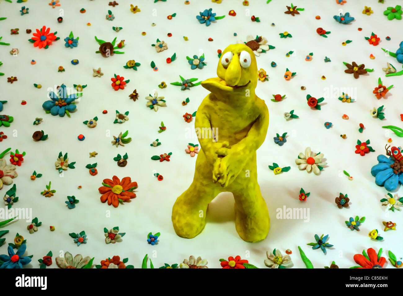 plasticine character in a flowered background Stock Photo - Alamy