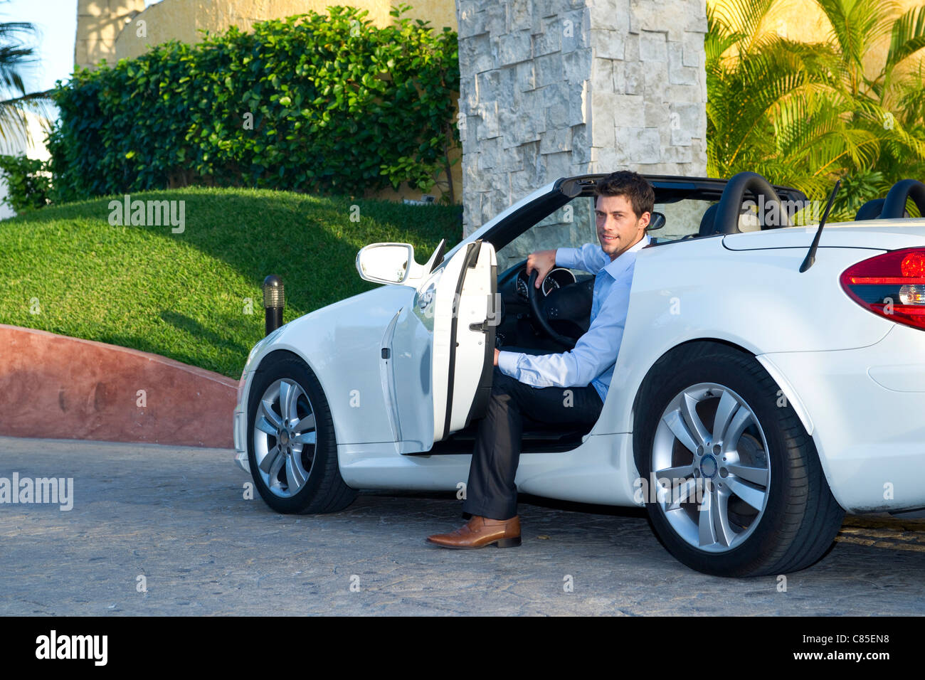 Man Getting Out of Car, Reef Playacar Resort and Spa Hotel, Playa del ...