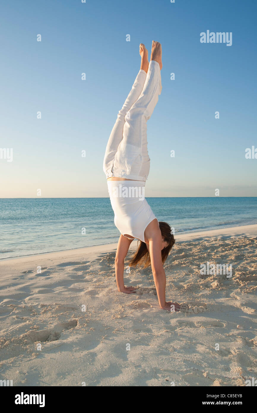 Woman doing Handstand on Beach, Reef Playacar Resort and Spa, Playa del ...