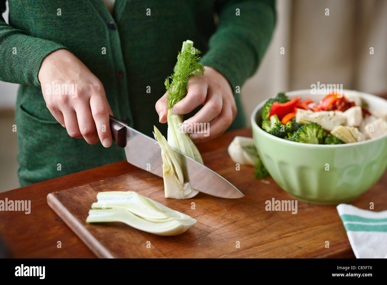 Woman Chopping Vegetables Stock Photo - Alamy