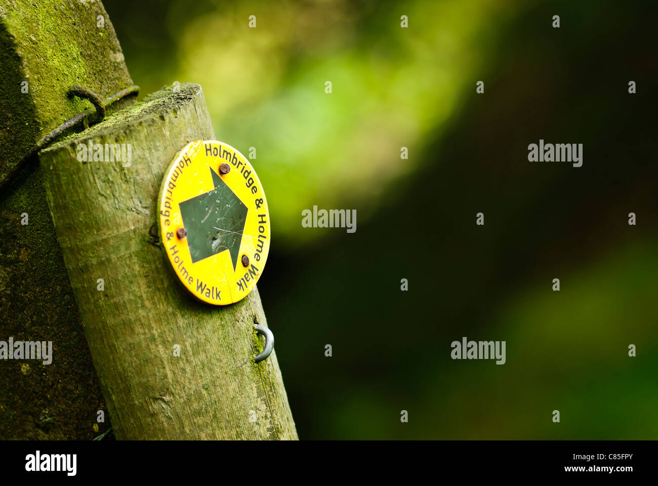 Walking arrow path sign wall hi-res stock photography and images - Alamy