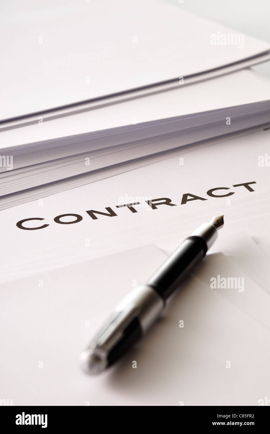Pen on Contract Stock Photo - Alamy