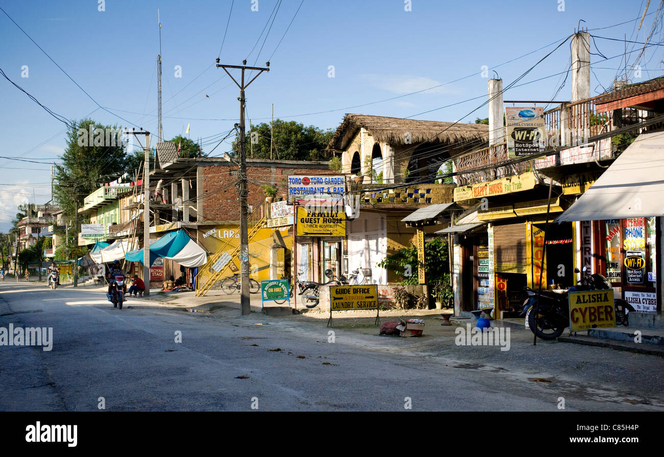 Main street in the town of Sauraha, the gateway to Chitwan National ...