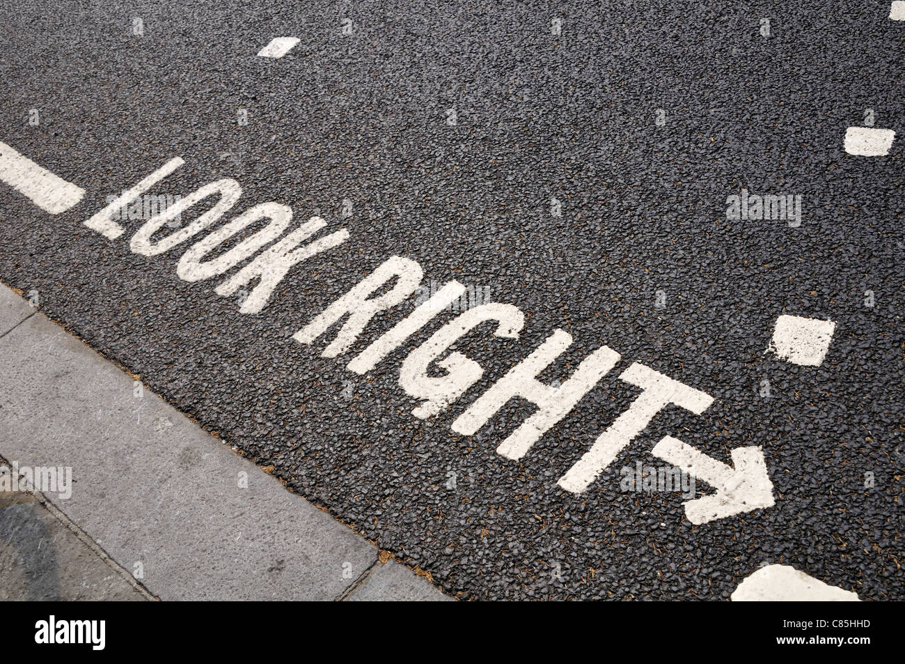 Look Right Warning at Crossing on Road Stock Photo - Alamy