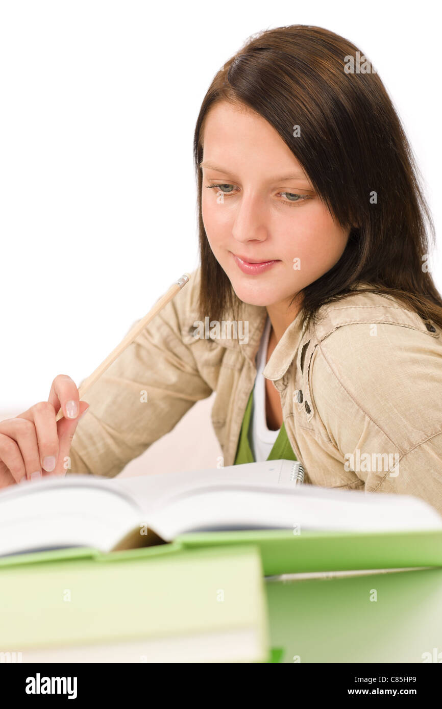 Student teenager happy girl write homework with book Stock Photo - Alamy