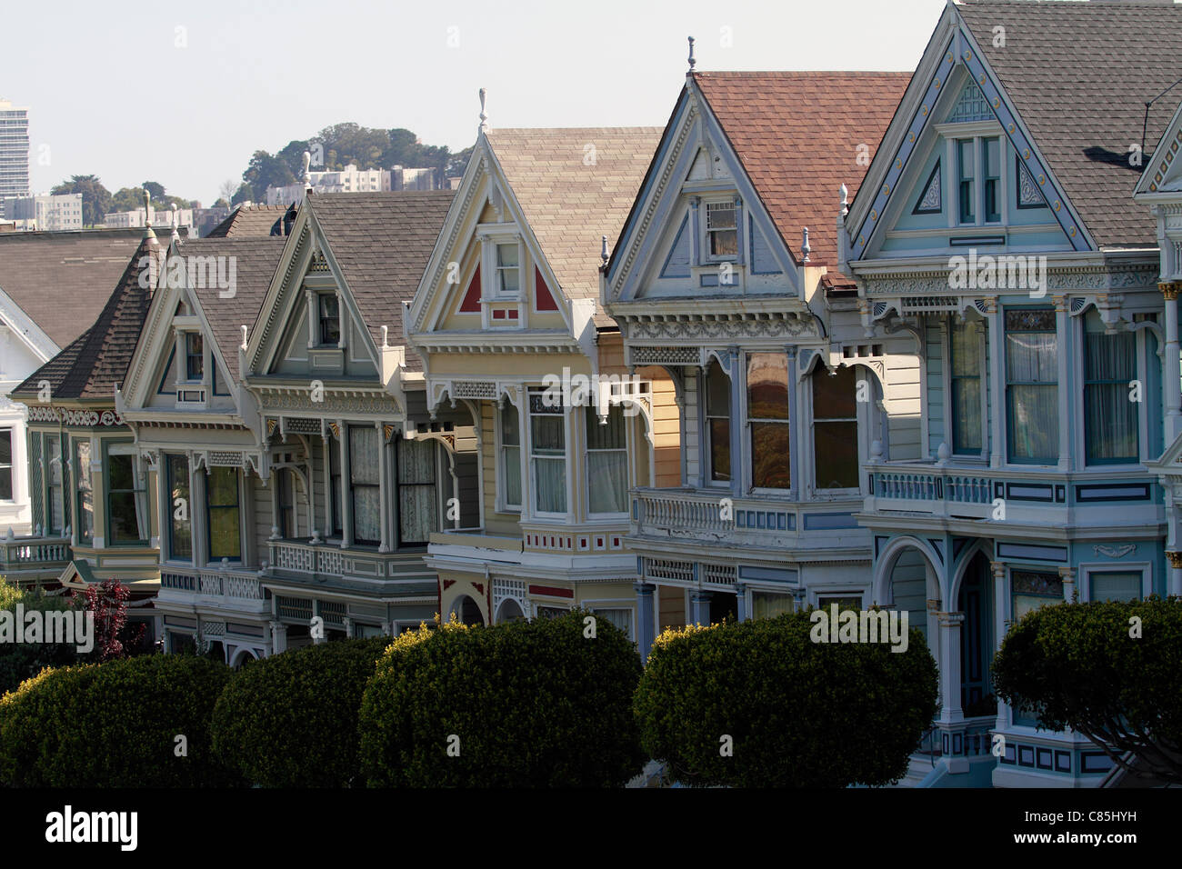 San Francisco's Alamo Square surrounded by Victorian Architecture. A ...